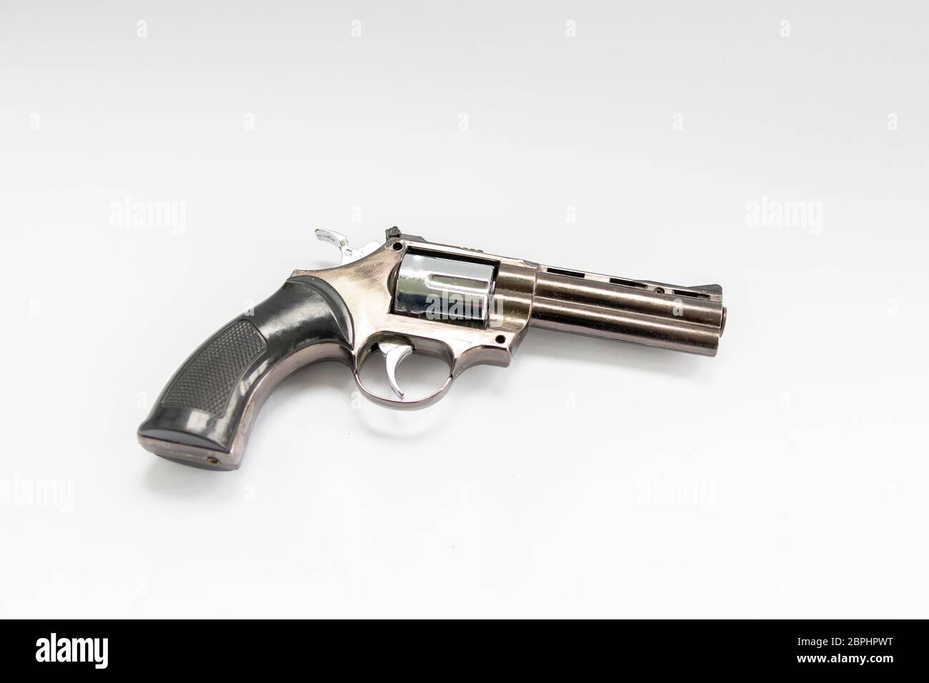 revolver on white background Stock Photo - Alamy