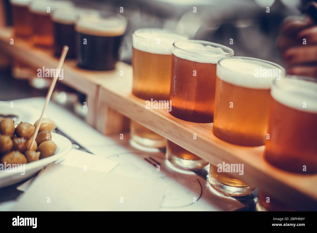 Selection of beers on a tasting mat Stock Photo - Alamy