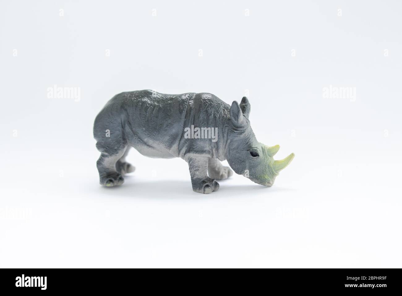 toy rhino on white background Stock Photo - Alamy