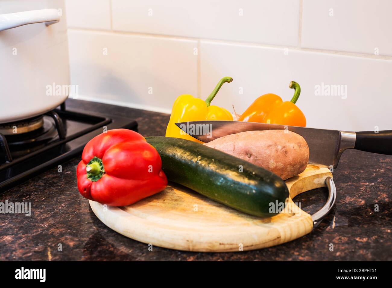 Fresh vegetables in the kitchen, healthy food on the kitchen counter ...
