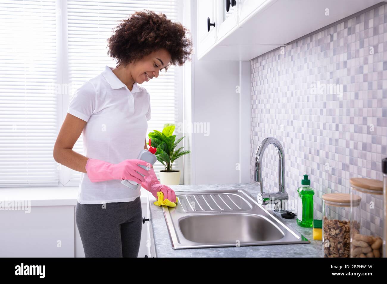 Lady janitor hi-res stock photography and images - Alamy