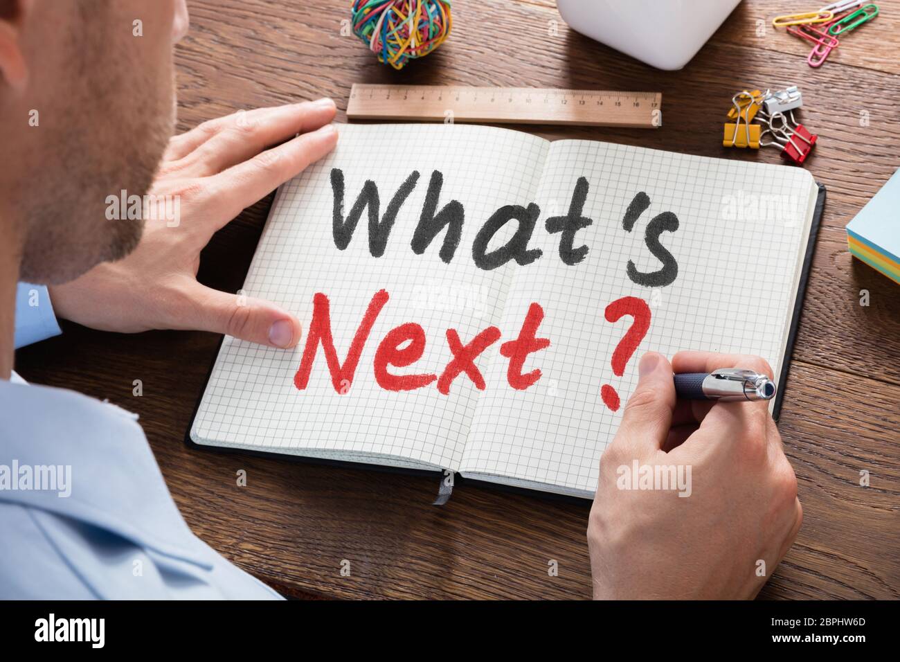 Businessman writing on a sticky note hi-res stock photography and ...