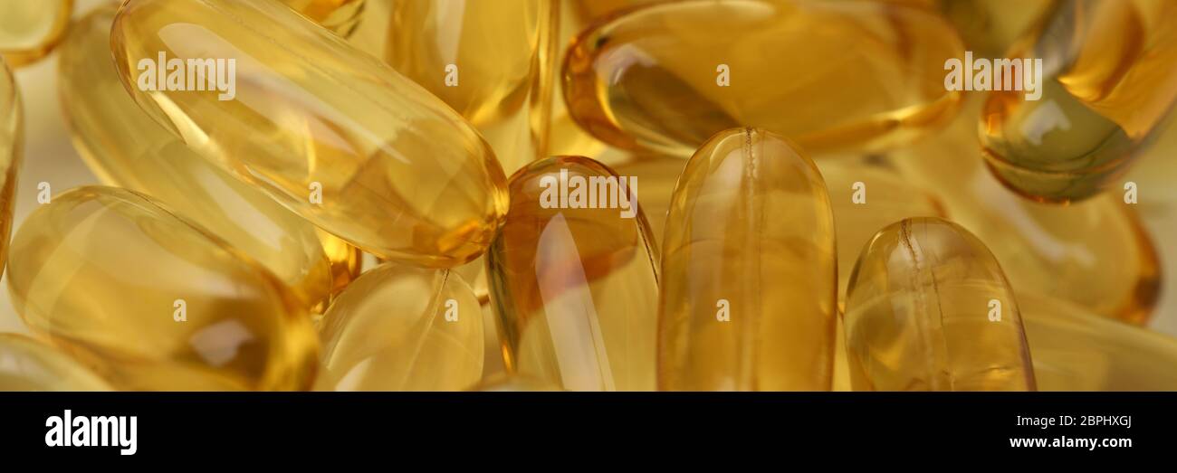 Yellow jelly drugs for health Stock Photo - Alamy