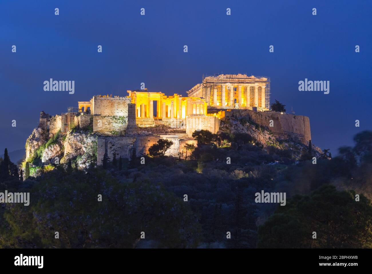 Acropolis Hill, crowned with Parthenon during evening blue hour in Athens, Greece Stock Photo ...