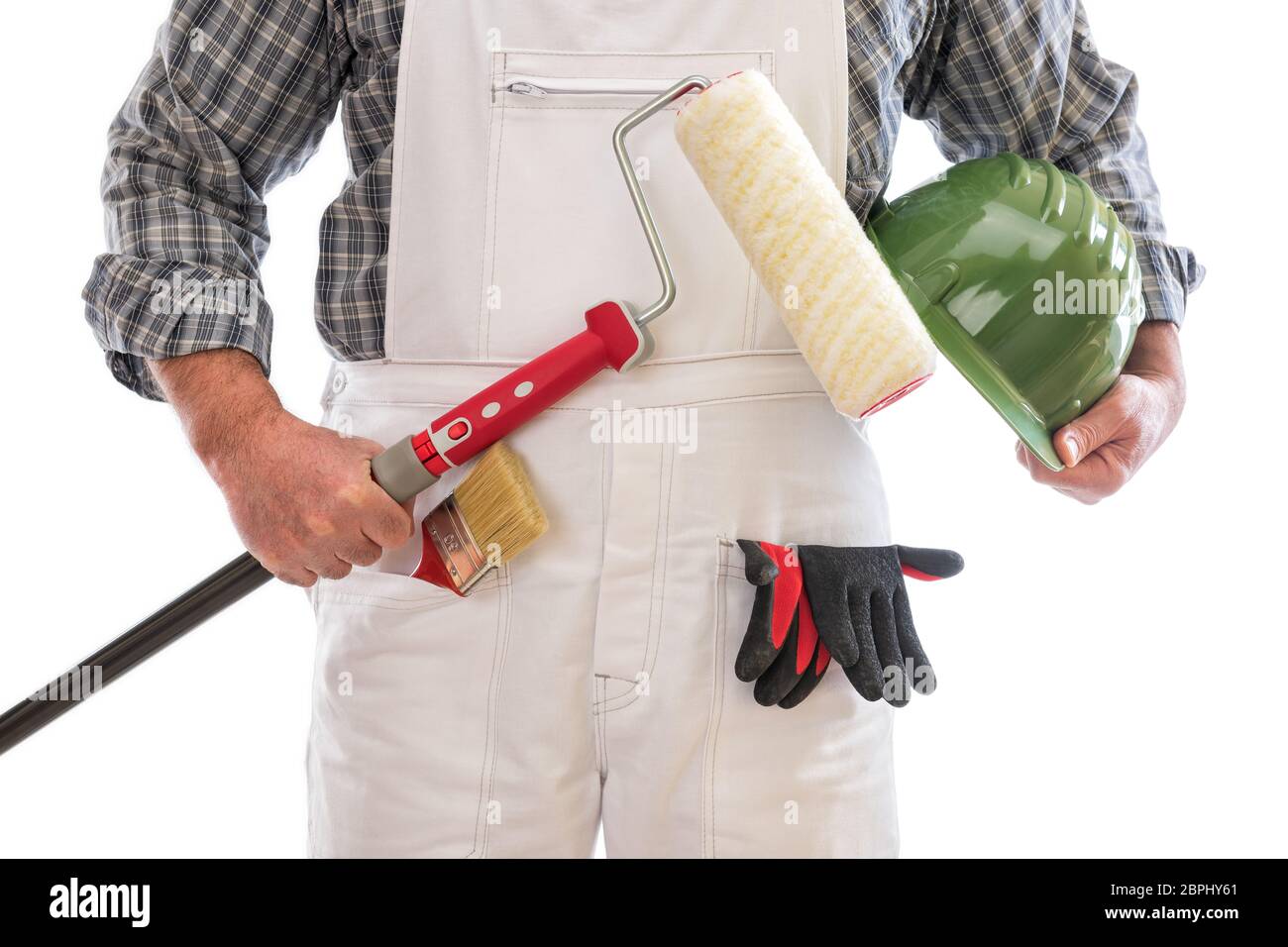 House painter worker with white work overalls, holds in his hand the ...