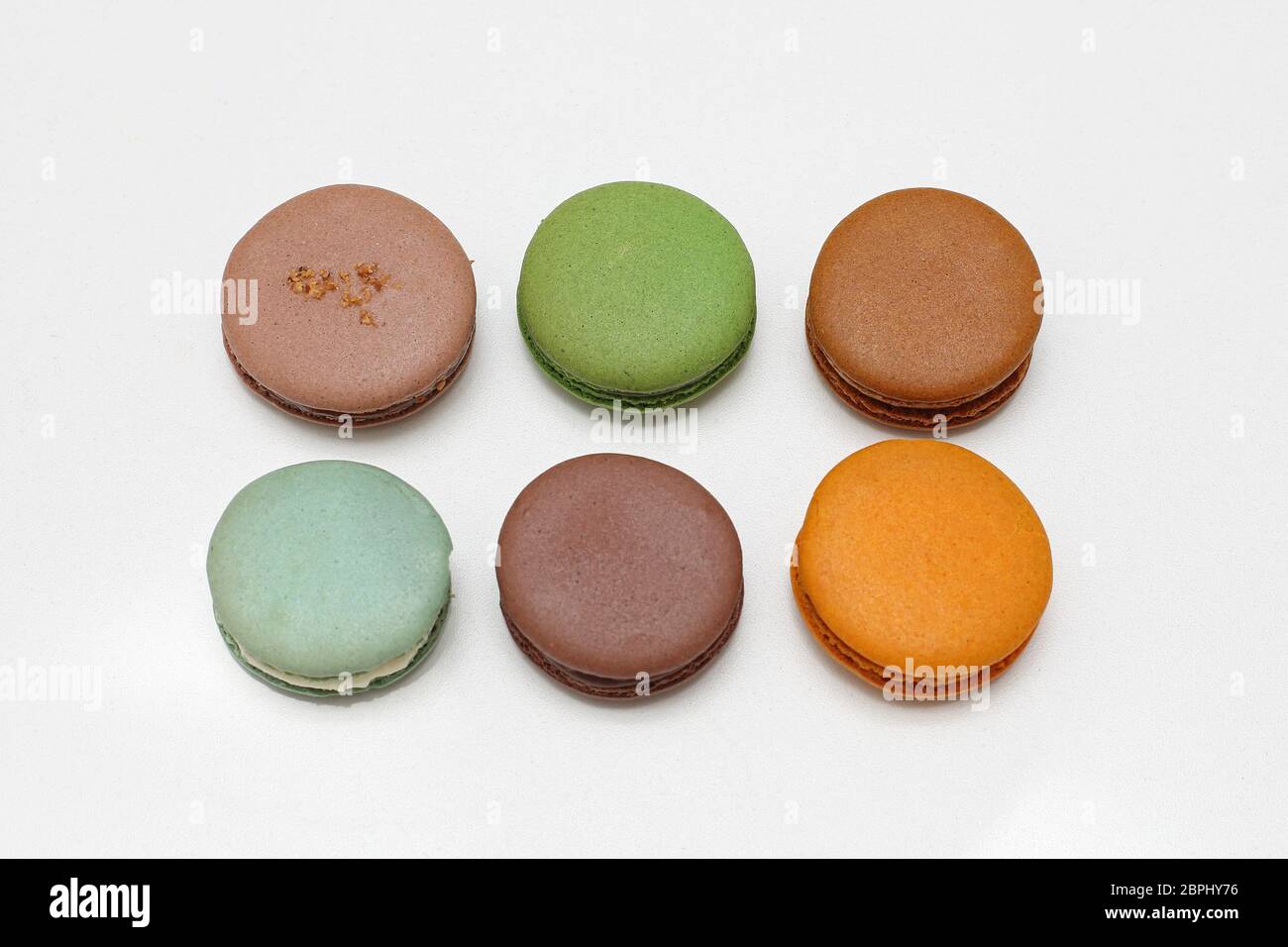 Six Colourful Macarons in Different Flavors Stock Photo - Alamy