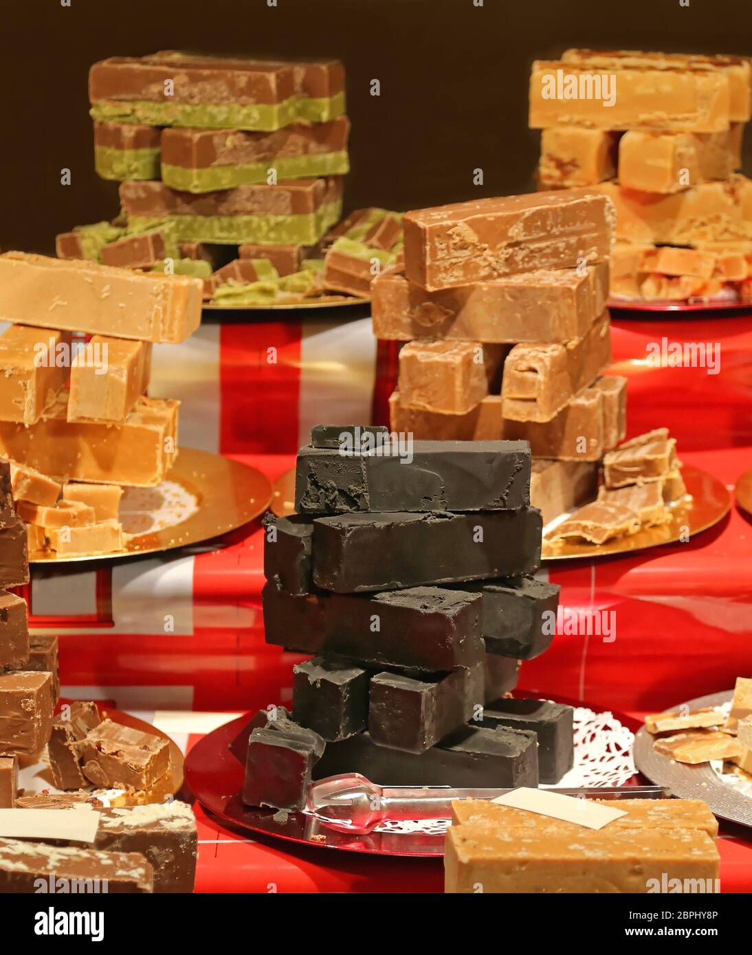 Big Piles of Various Sweet Fudges Candies Stock Photo - Alamy