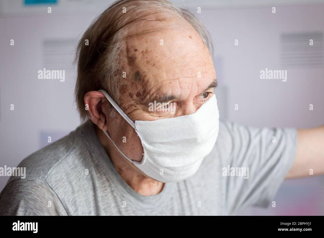 Elderly man at home isolation Stock Photo - Alamy