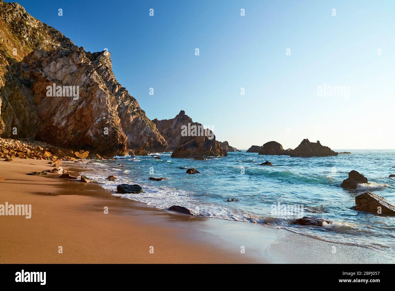 Ursa Beach under the cliff in stunning daylight colors. Lisbon ...
