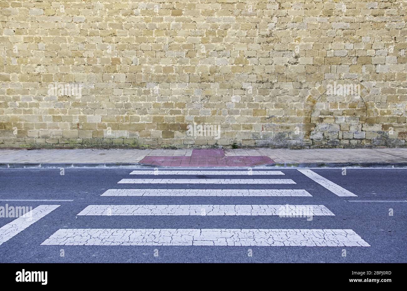 Zebra crossing to safely cross the street, detail of road safety ...