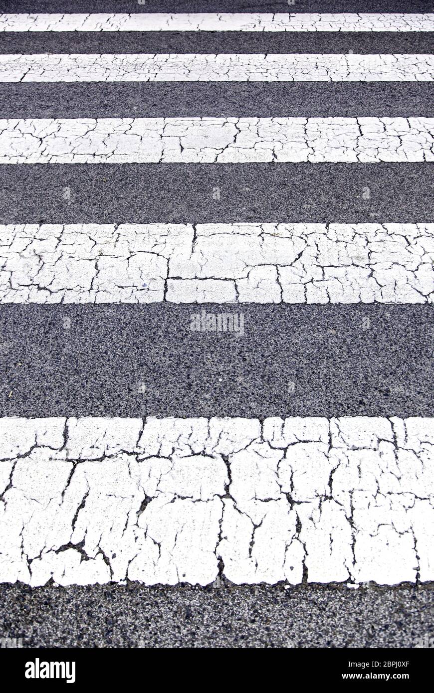 Zebra crossing to safely cross the street, detail of road safety ...