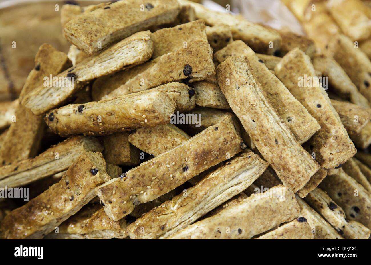 Traditional seed bread in an old bakery, detail of basic food, healthy ...