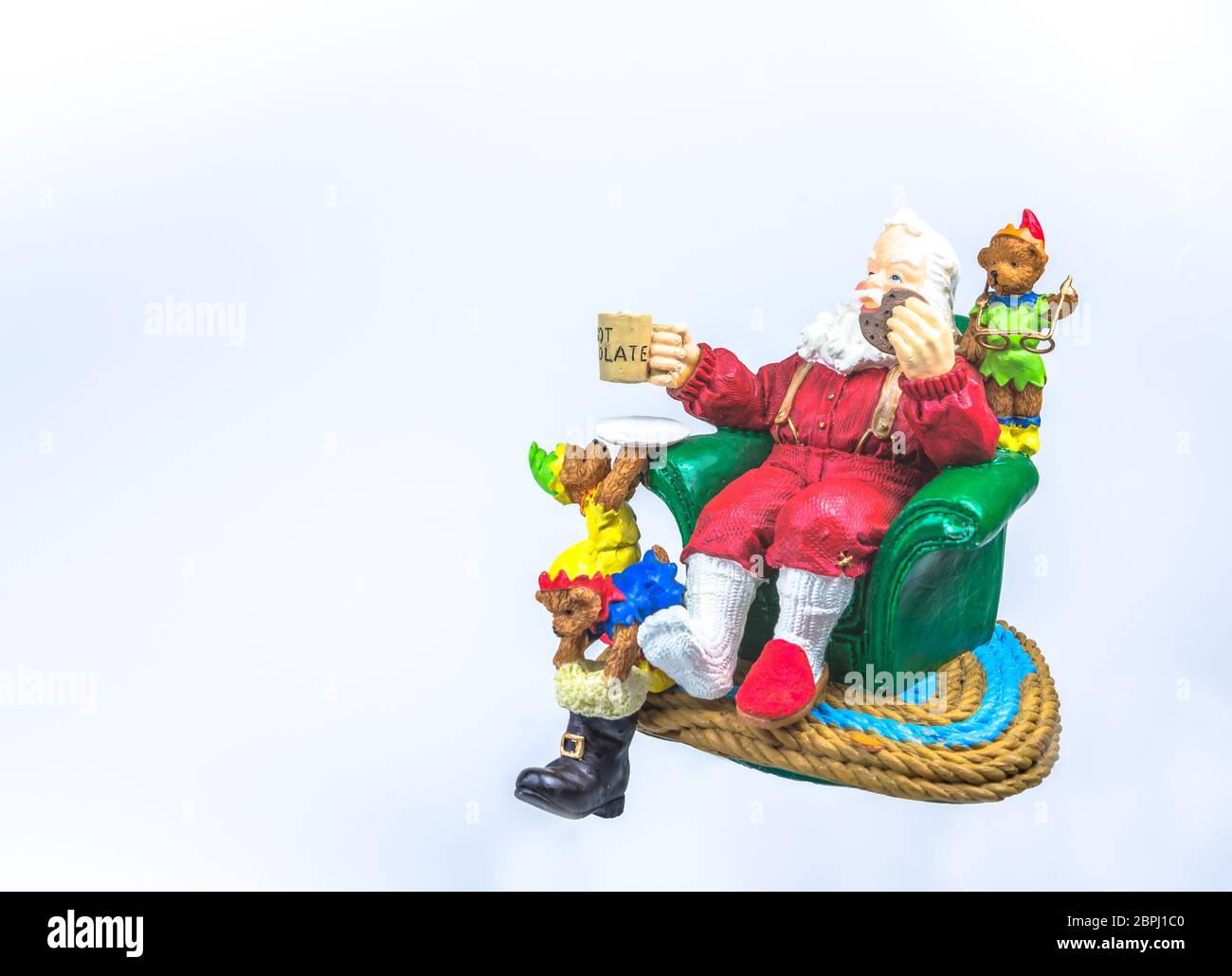 santa claus rest on the green sofa after hard work on christmas day ...