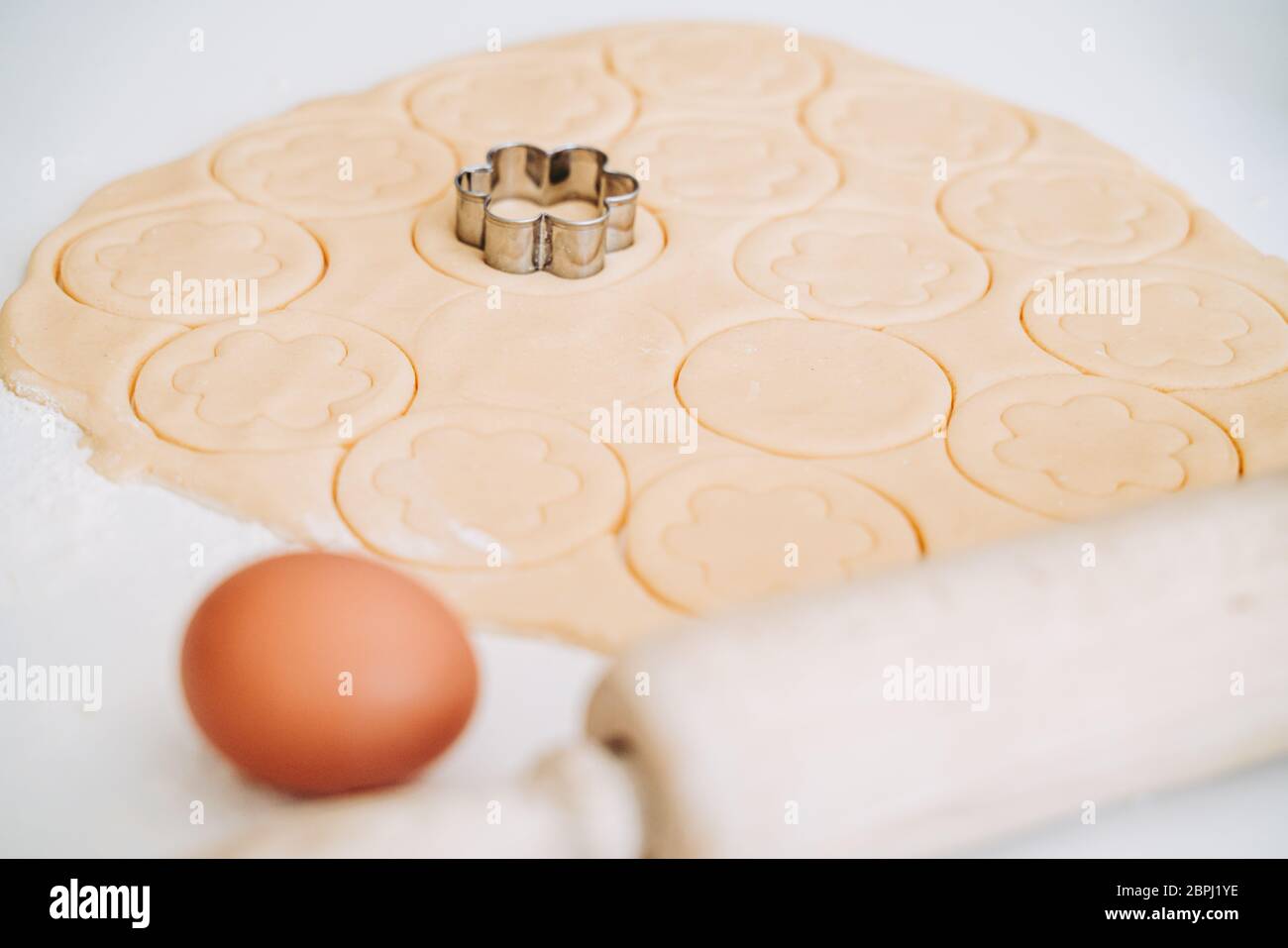 Making of delicious round shortcrust cookies for breakfast Stock Photo ...