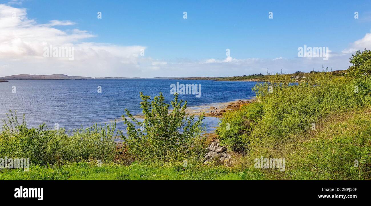 idyllic coastal scenery around Sky Road in Connemara, a region in ...