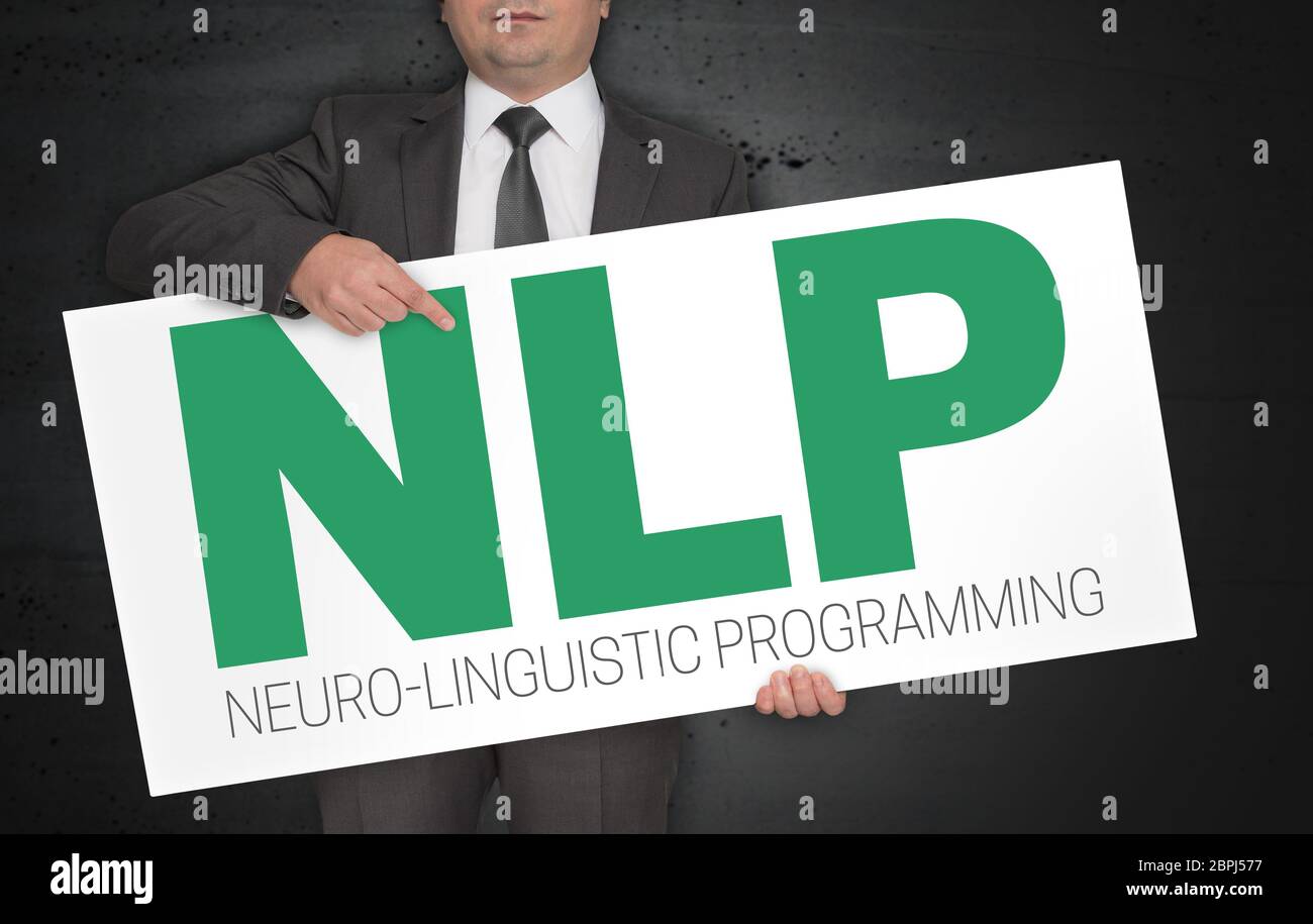 NLP poster is held by businessman Stock Photo - Alamy