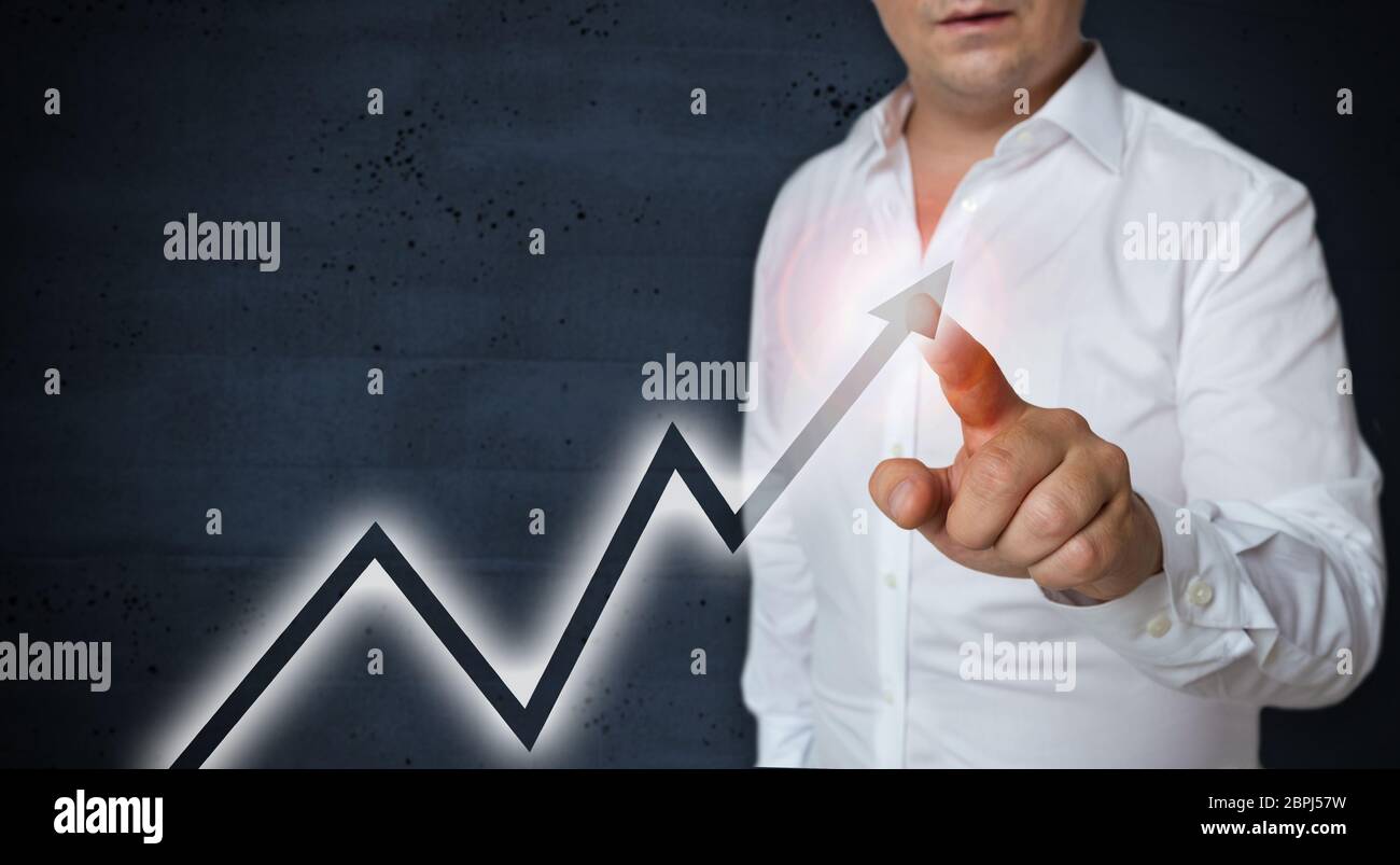 Graph touchscreen is operated by man concept Stock Photo - Alamy