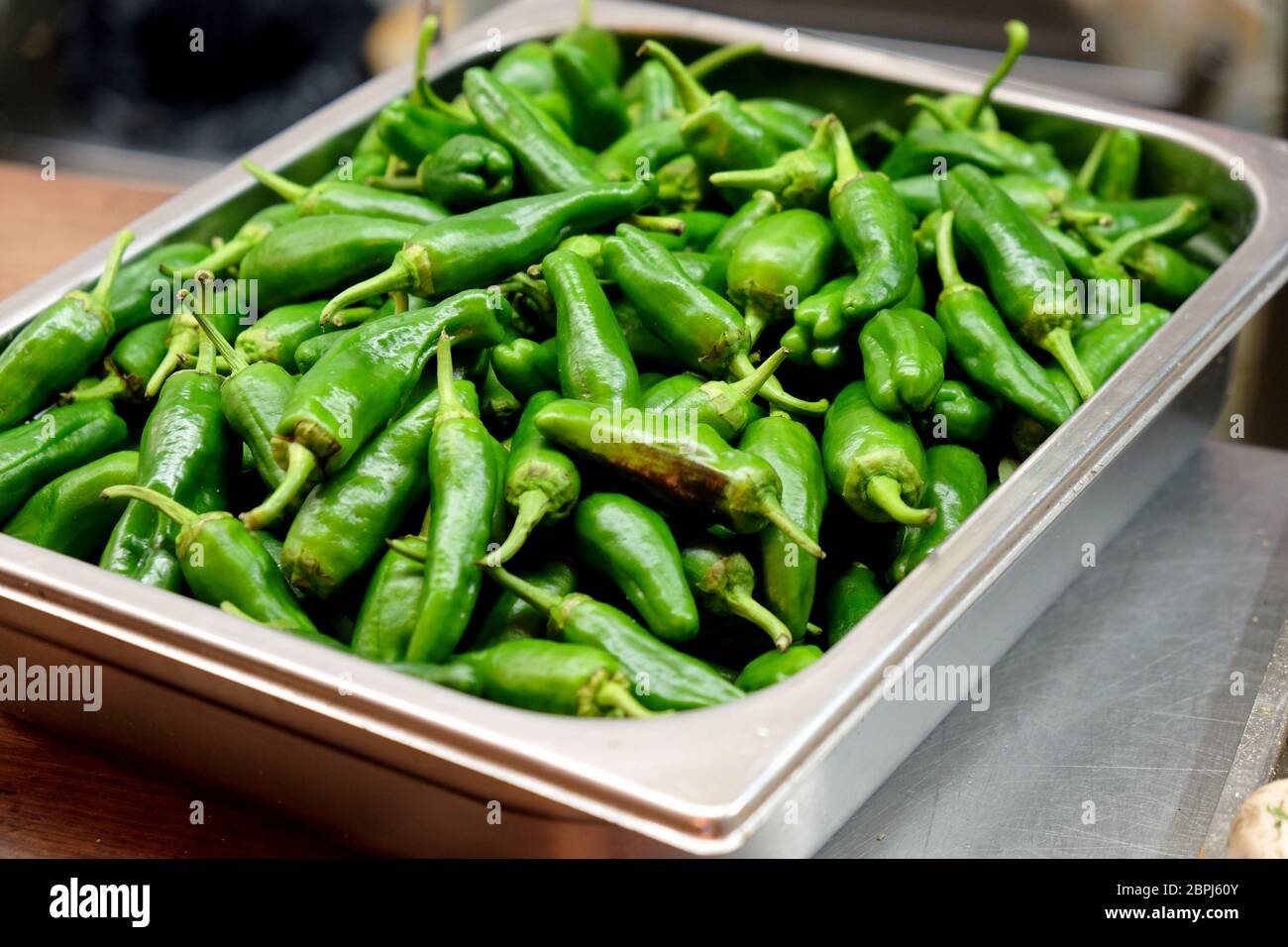 Grilled chili peppers as tapas in a Spanish bar Stock Photo - Alamy