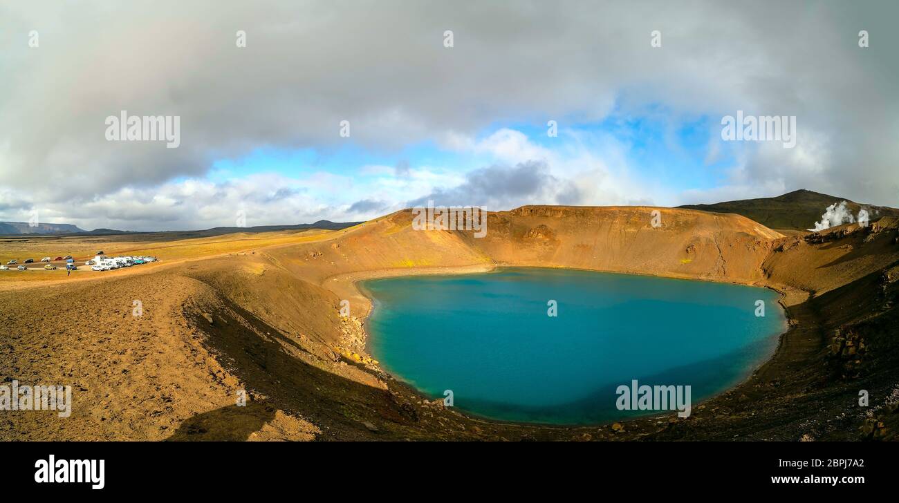 The mouth of a volcano crater filled with water in Iceland. Water Lake ...