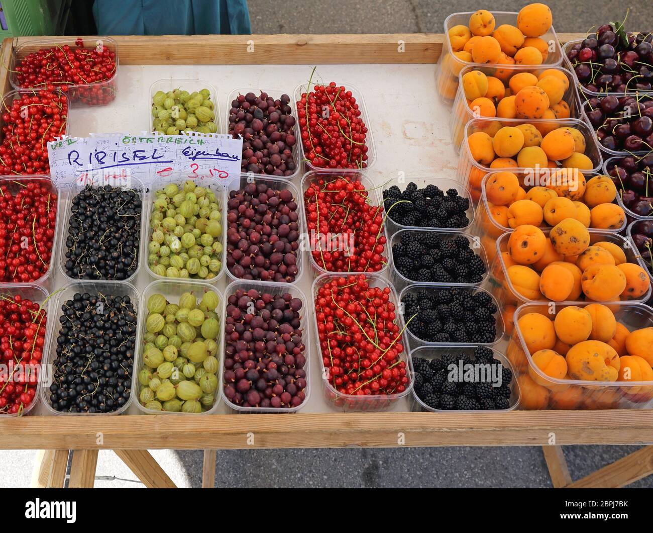 Various Fresh Berry Fruits in Plastic Trays Stock Photo - Alamy