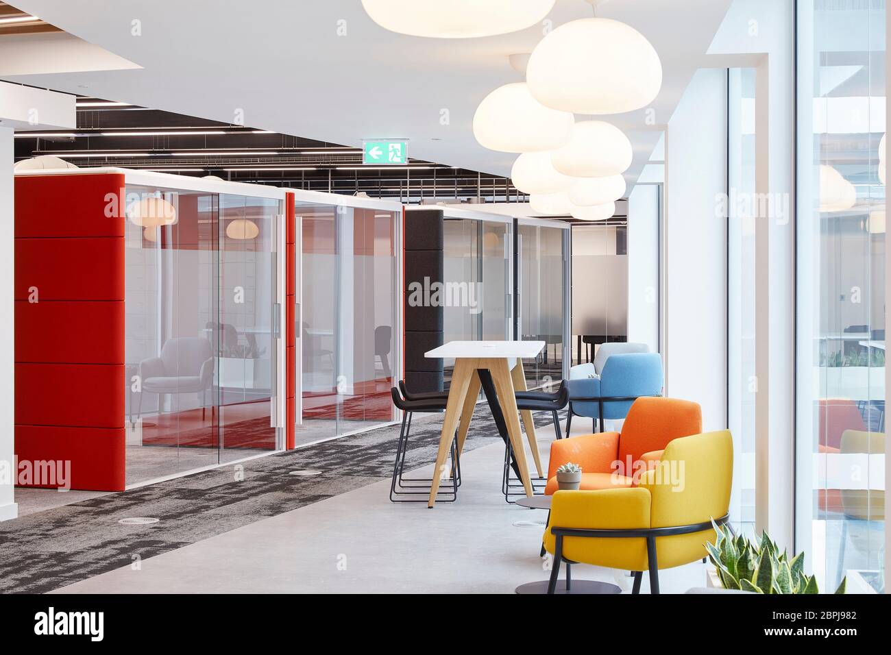 Contemporary UK office interior with primary colour furniture. UK ...