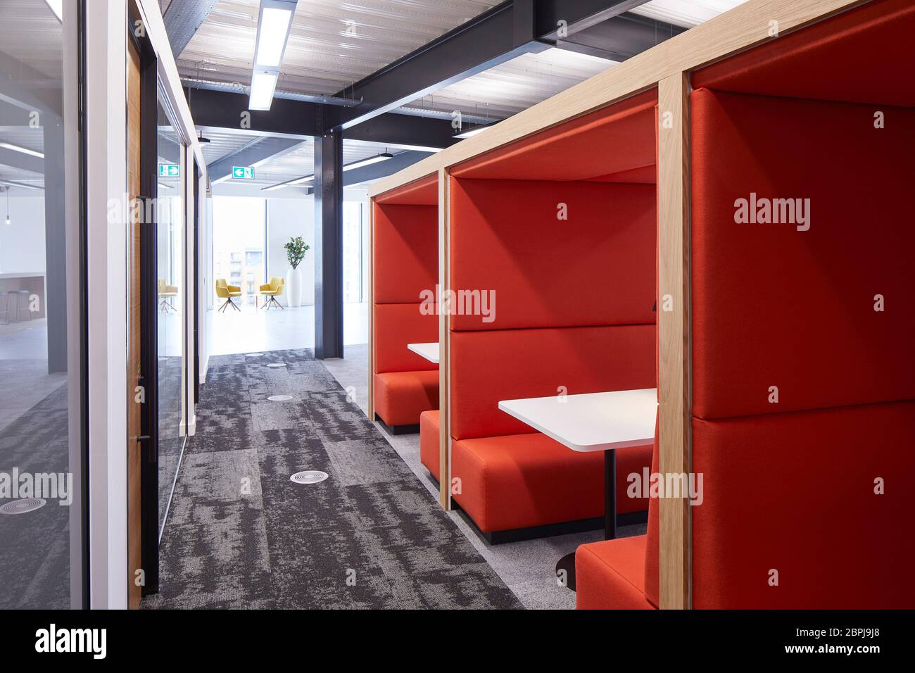 Contemporary UK office interior with primary coloured furniture. UK ...