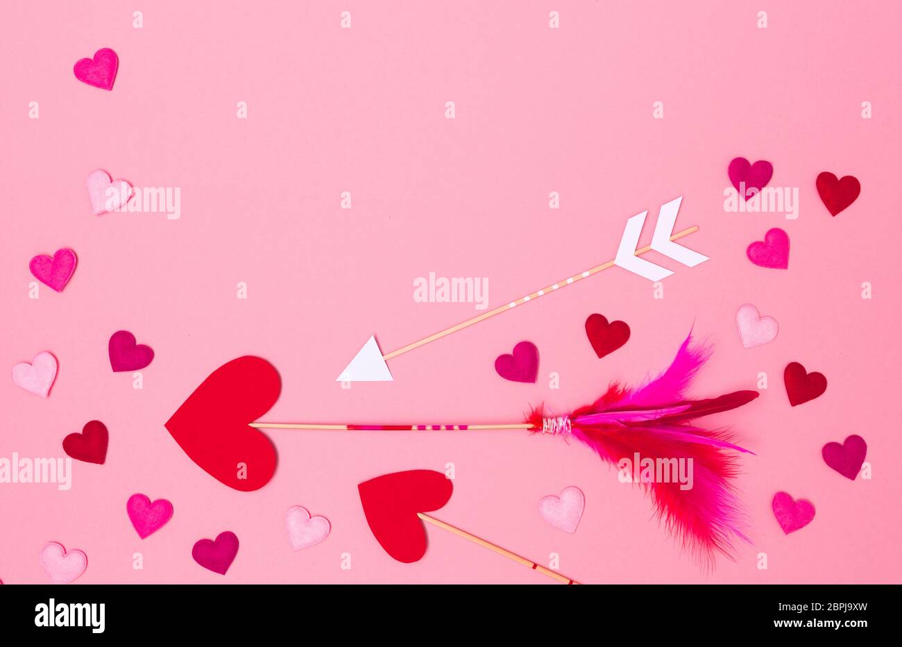 beautiful pink valentine background with love arrows and hearts Stock ...