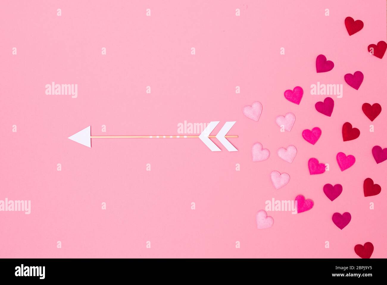 beautiful pink valentine background with love arrows and hearts Stock ...