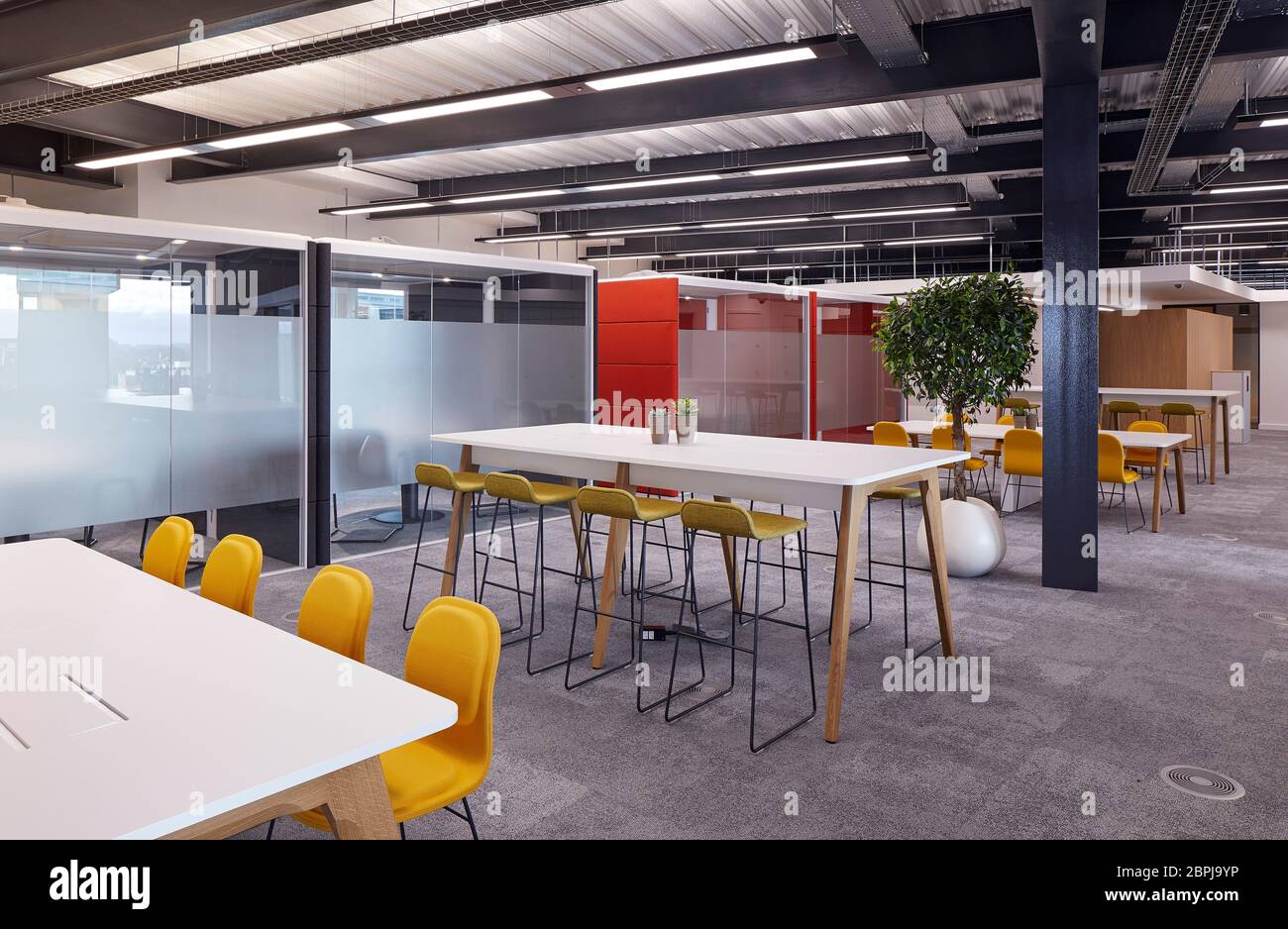 Contemporary UK office interior with primary coloured furniture. UK ...