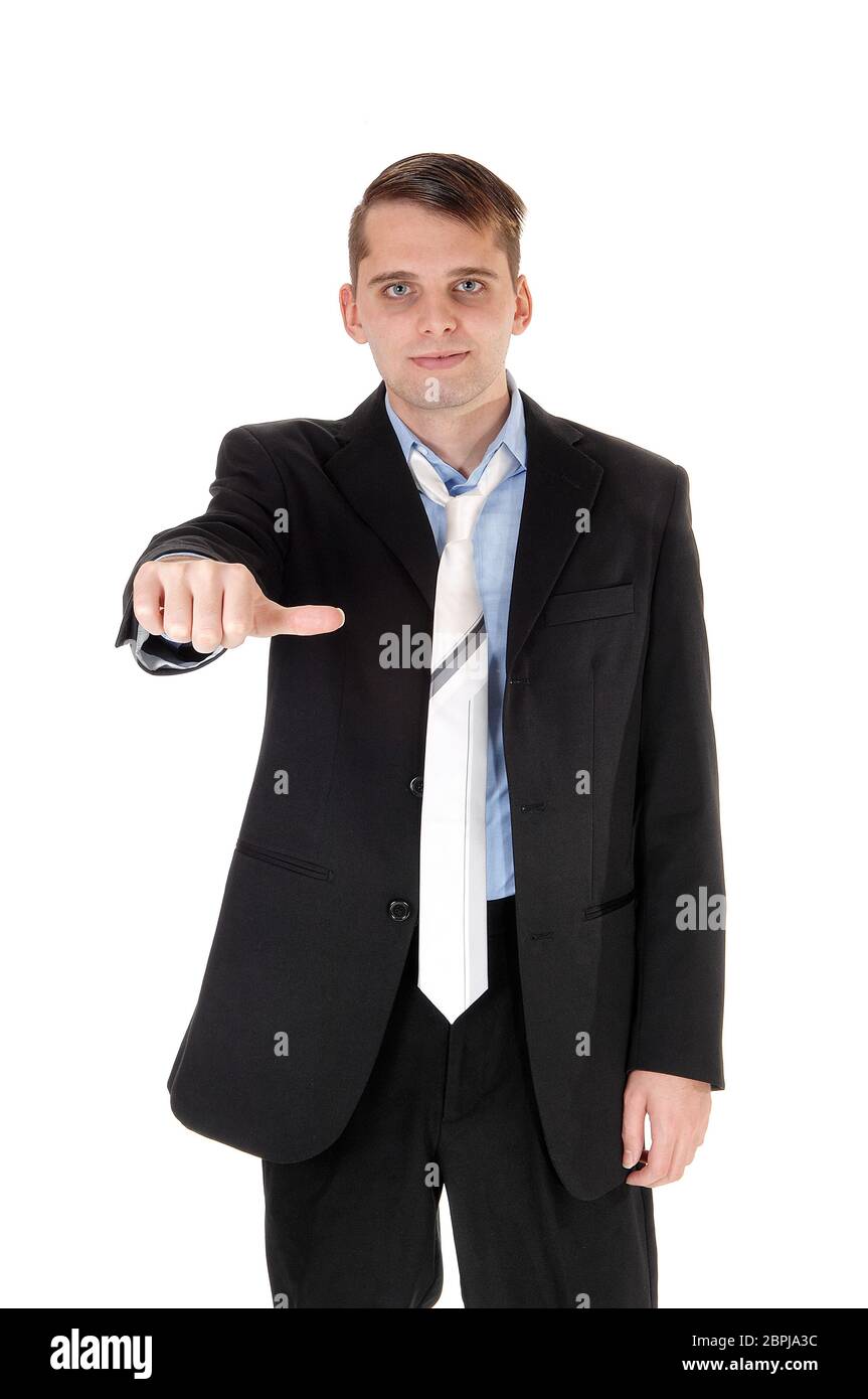 A serious unhappy man standing isolated for white background with a ...