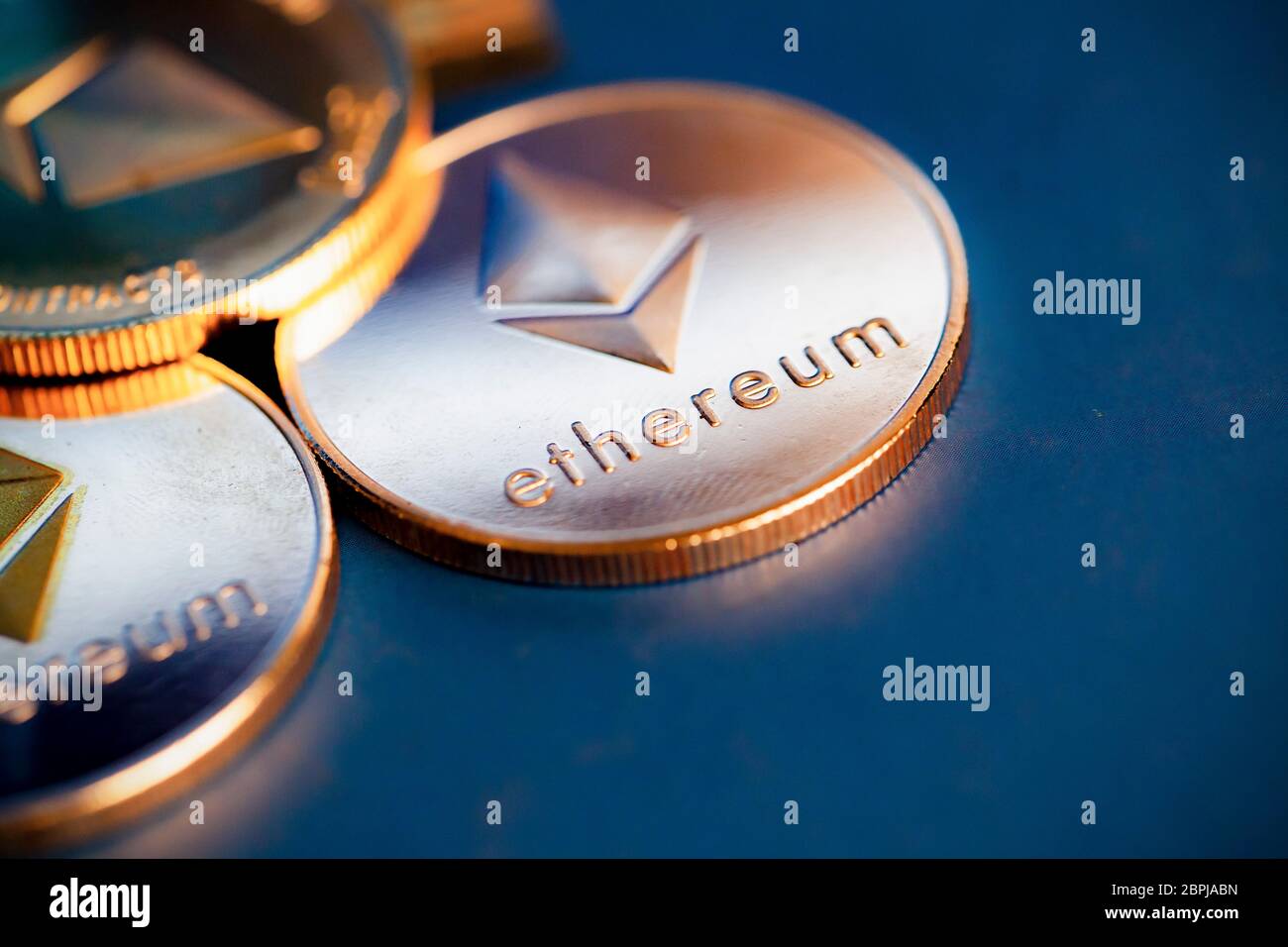 ethereum cryptocurrency golden coin Stock Photo - Alamy