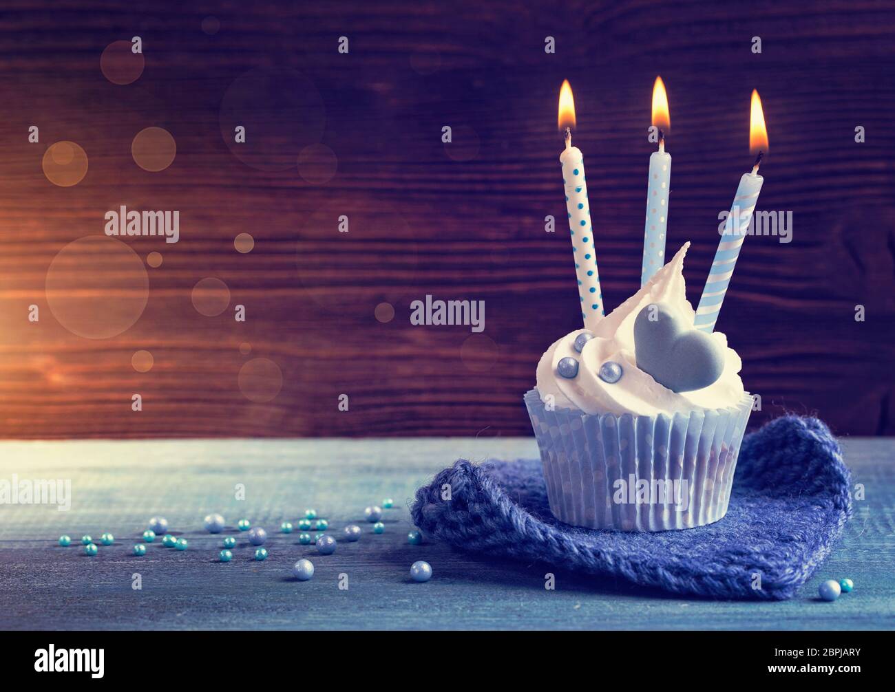Birthday cupcake candle bokeh hi-res stock photography and images - Alamy