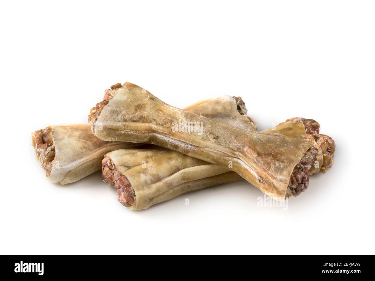 Dog chew bone isolated on a white background Stock Photo - Alamy