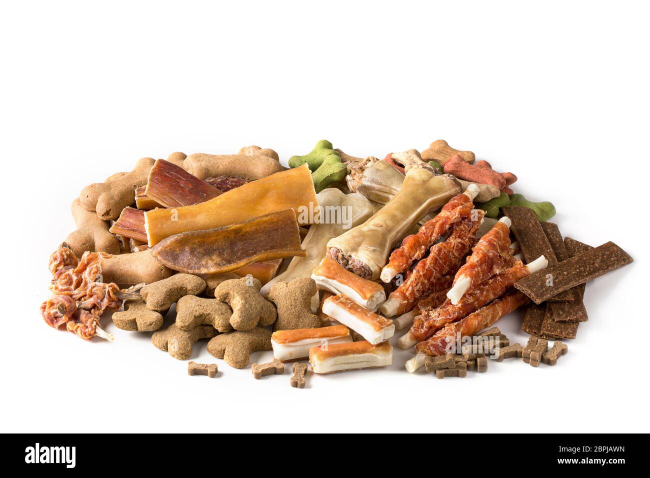 Assortment of dog snacks isolated on a white background Stock Photo - Alamy