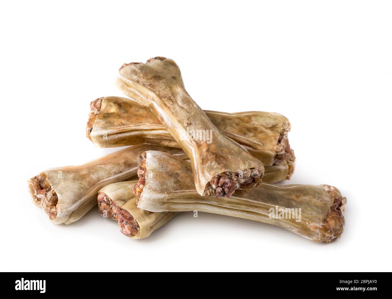 Dog chew bone isolated on a white background Stock Photo - Alamy