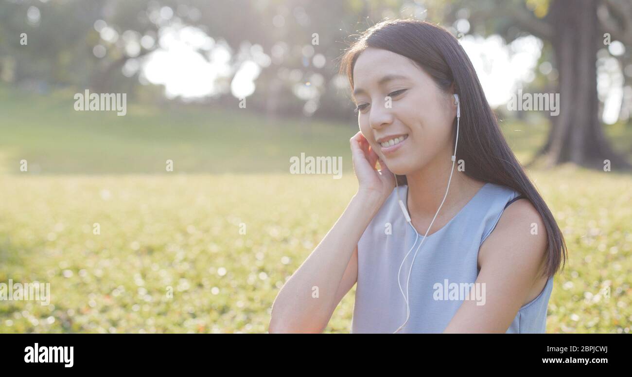 Woman enjoy listen to music Stock Photo - Alamy