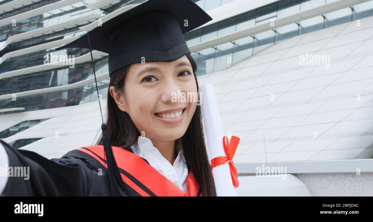 Excited graduation Woman make a video call Stock Photo - Alamy