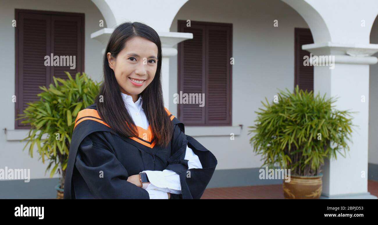 Woman get graduation in university campus Stock Photo - Alamy