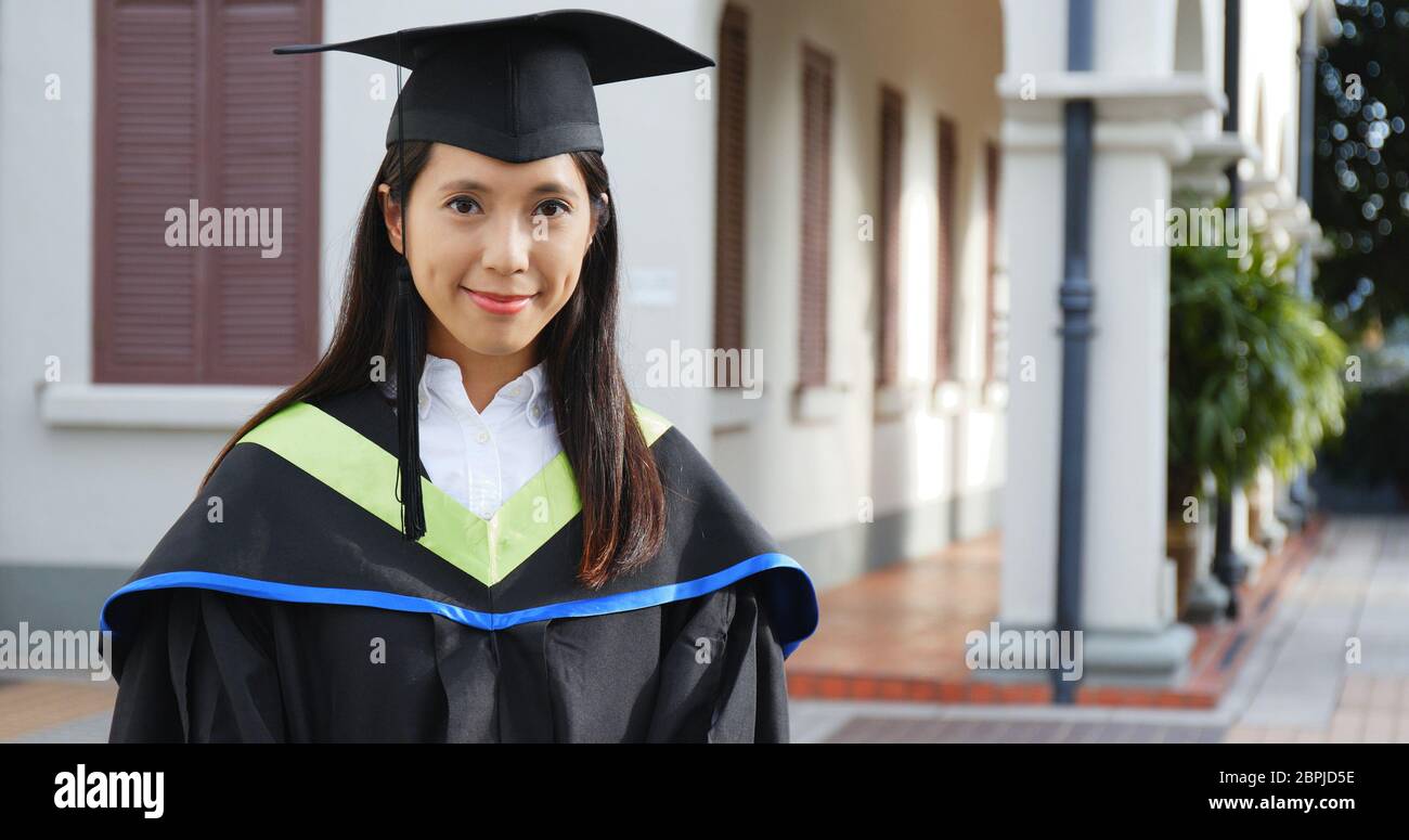 Happy graduate student girl Stock Photo - Alamy
