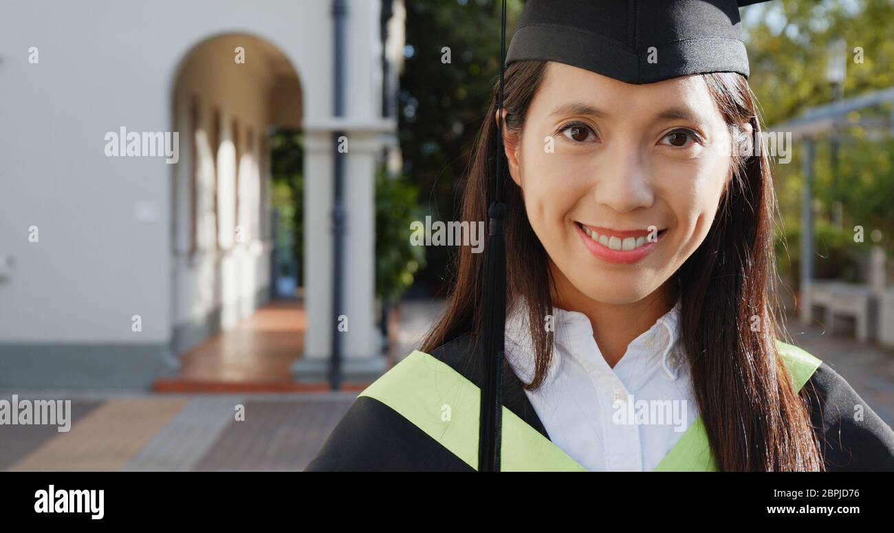 Happy graduate student girl Stock Photo - Alamy