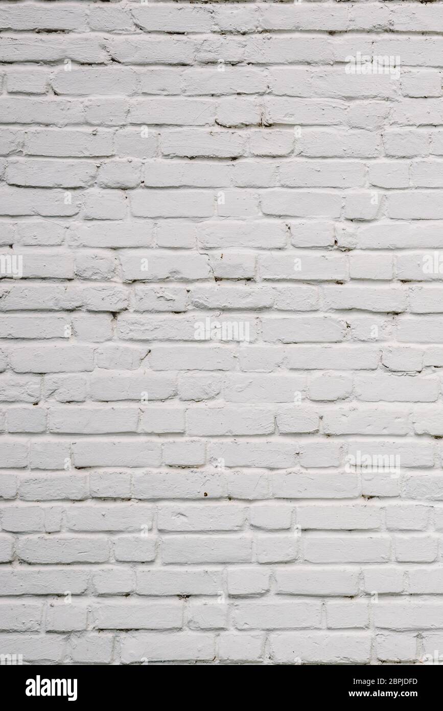 Background or texture of White Chipped Brick Wall Stock Photo - Alamy