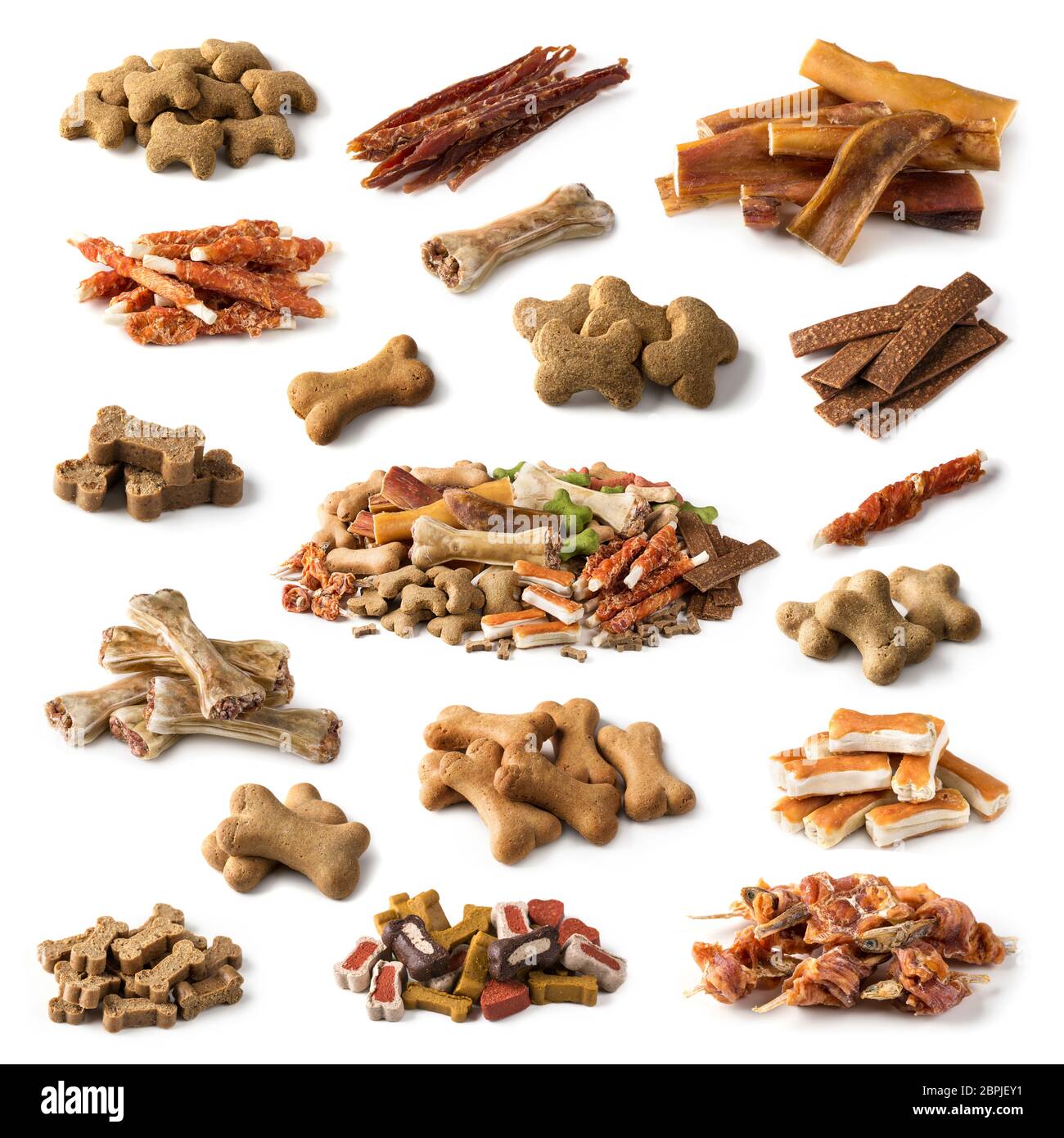 Collection of dog snacks isolated on a white background Stock Photo - Alamy