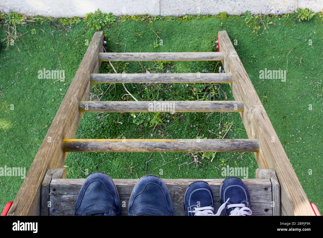 Father son standing on ladder hi-res stock photography and images - Alamy