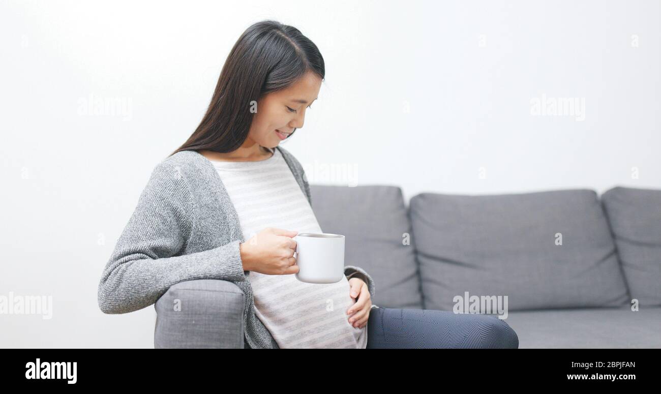 Beautiful pregnant woman cup drink hi-res stock photography and images ...