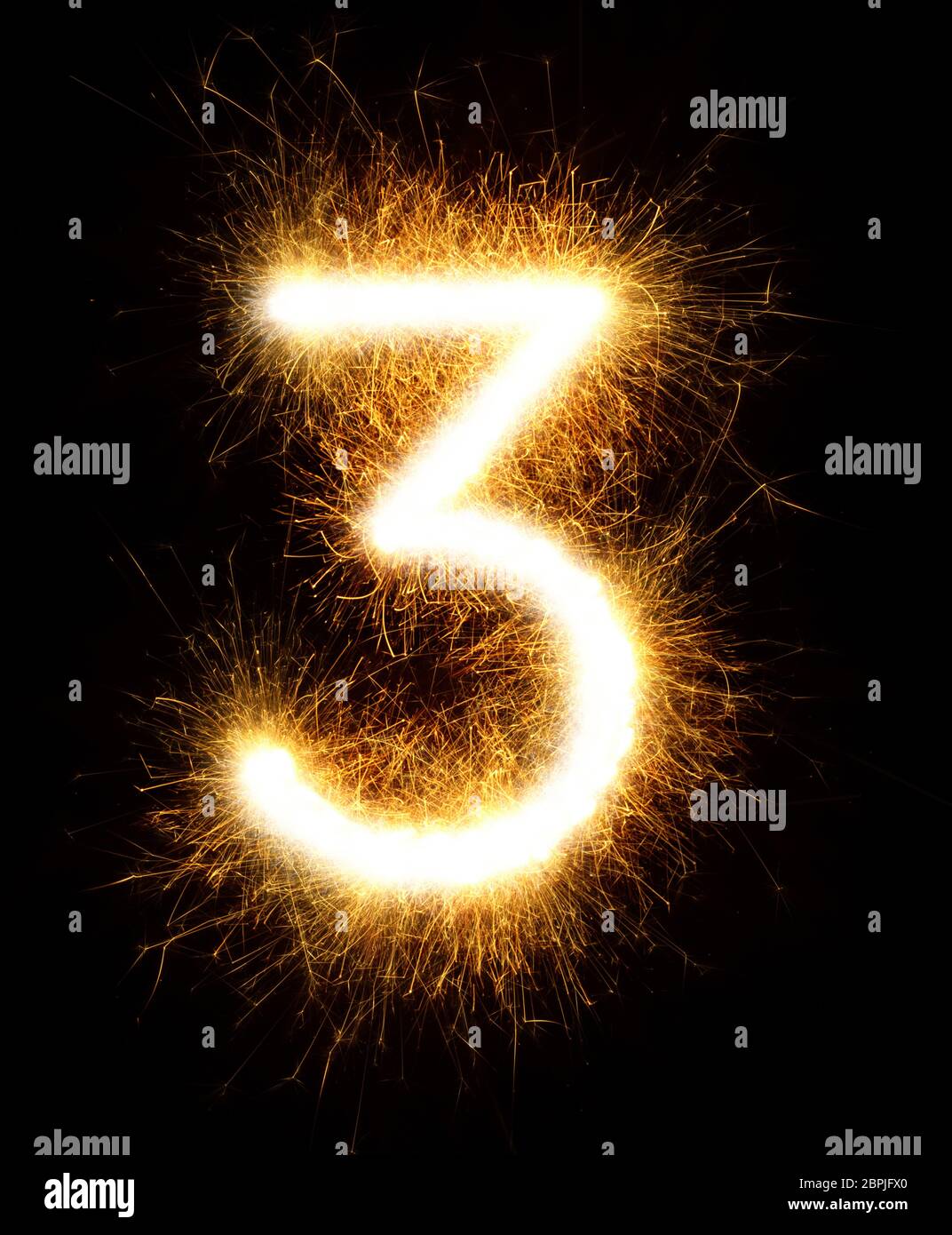 Number 3 drawn with spaklers on a black background Stock Photo - Alamy