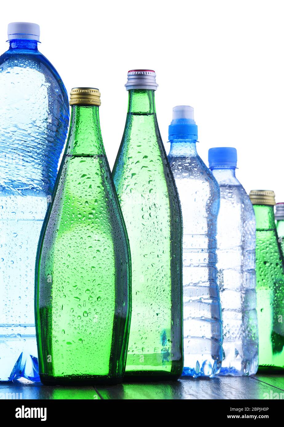 Composition with different sorts of bottles containing mineral water ...