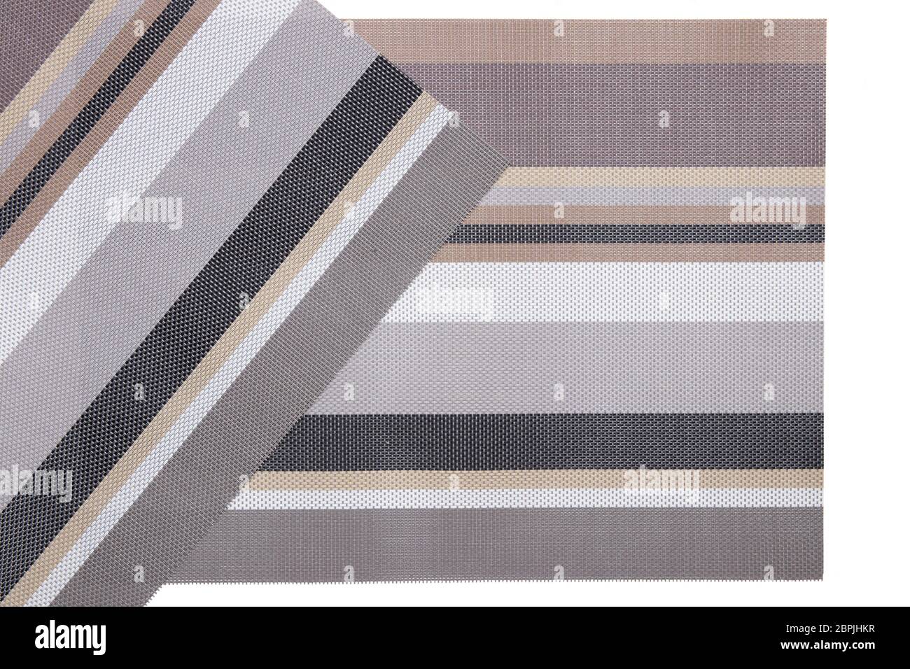 Plastic mats backgrounds. Two woven plastic mats with a colorful ...