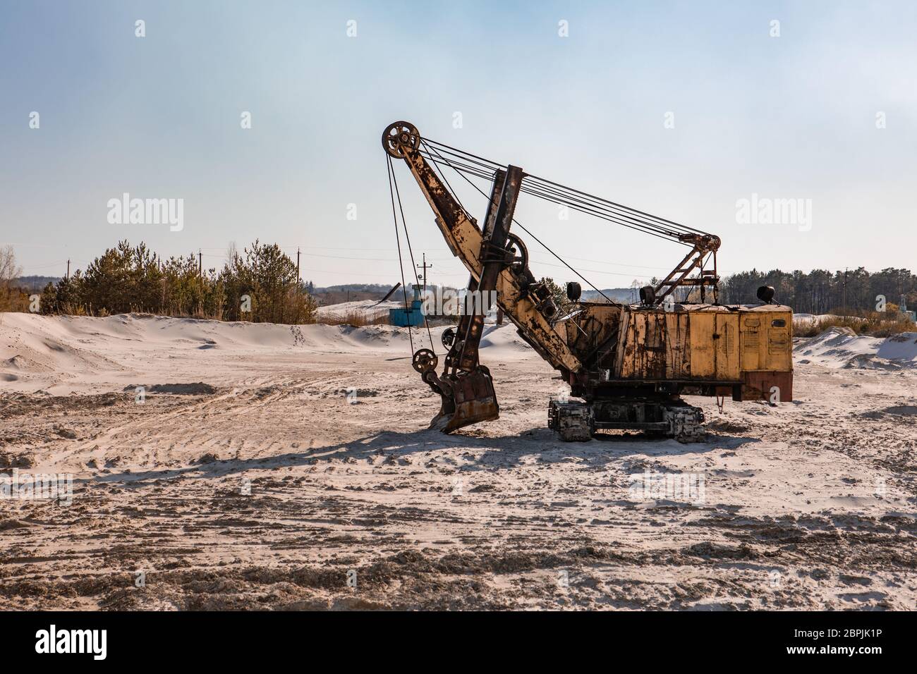 heavy industry old rusty excavator at sand quarry Stock Photo - Alamy