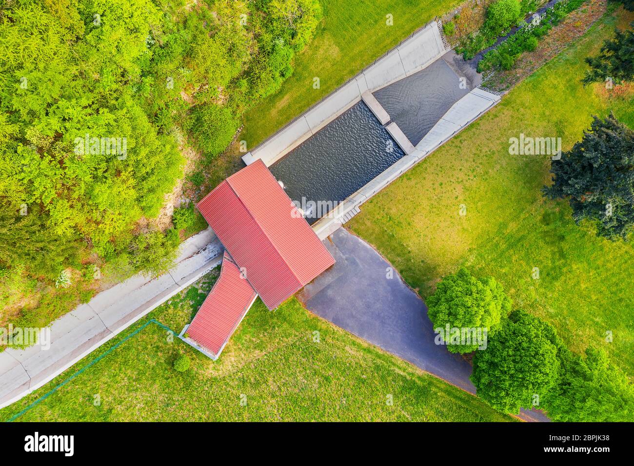 water dam and water house and drain in the sun from above Stock Photo ...