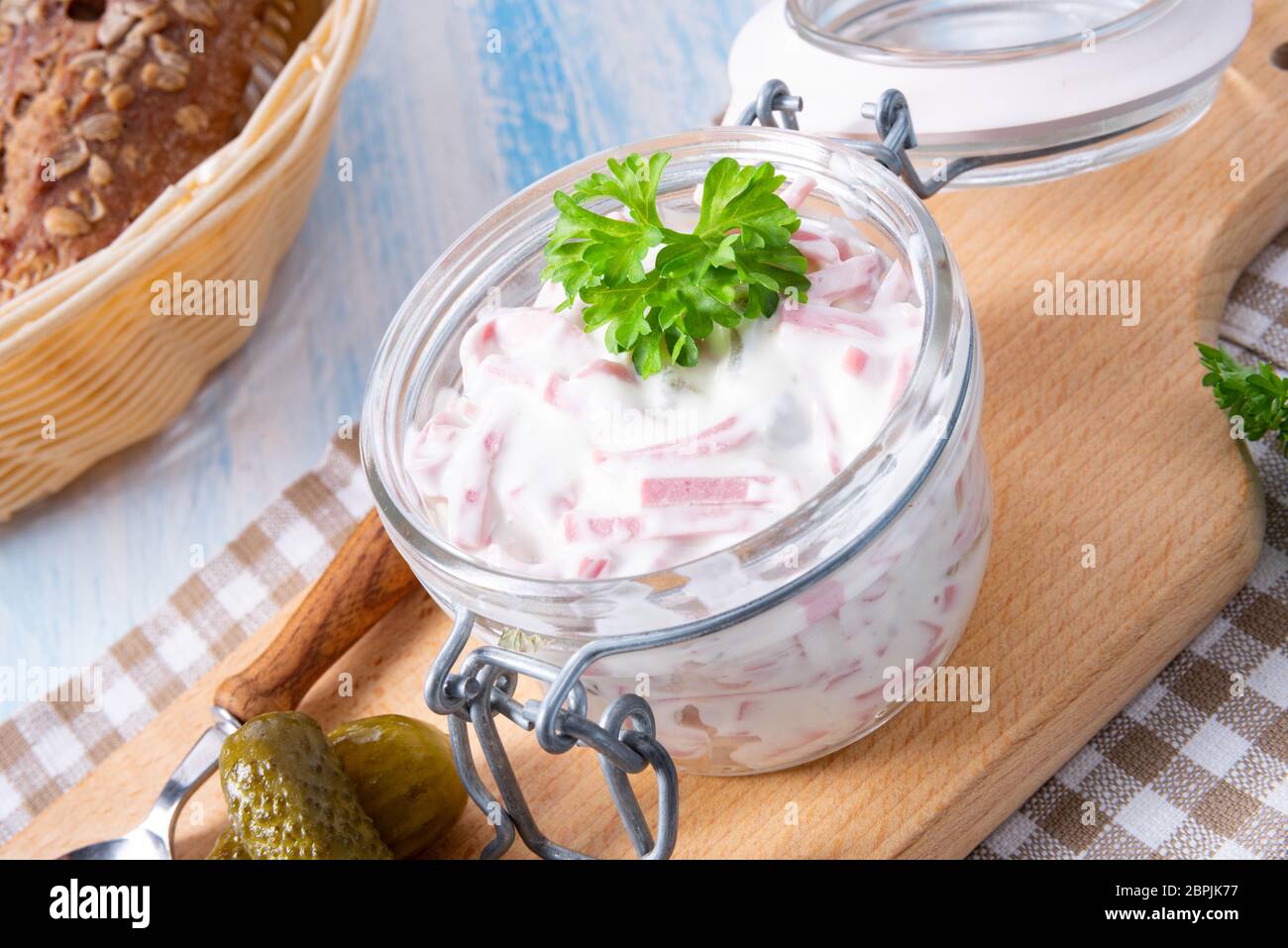 delicious homemade meat salad with mayonnaise and cucumber Stock Photo ...